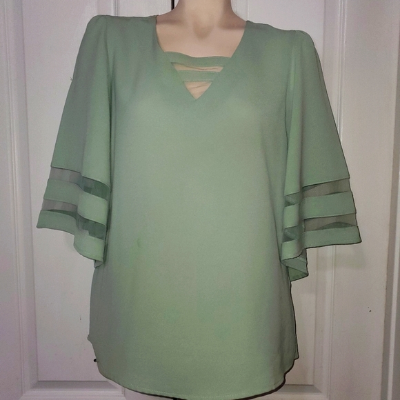 Tops | Pastel Lime Green Top With Sheer Stripes On The Sleeves | Poshmark
